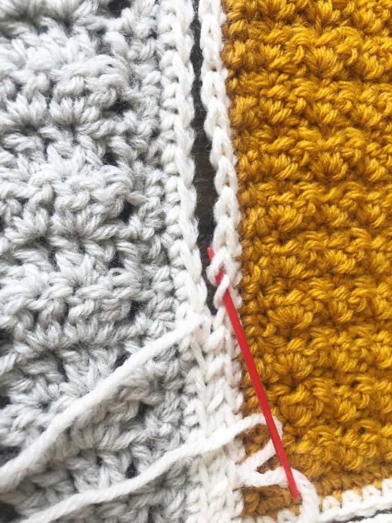 How to Whip Stitch Crochet Squares Together Tutorial - ChristaCoDesign